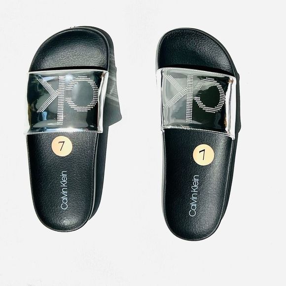 Calvin Klein | Shoes | New Calvin Klein Silver Metallic Ck Logo Flat ...
